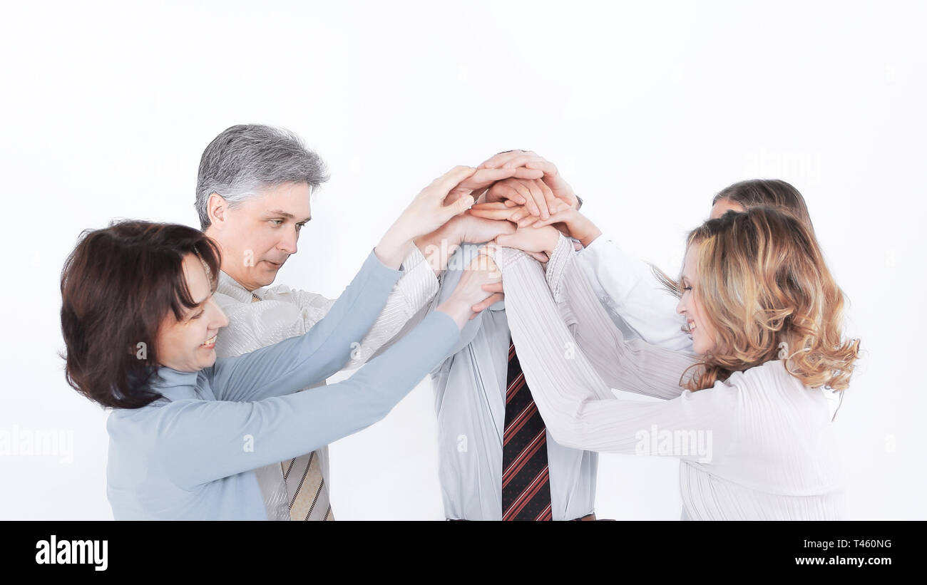 Successful business team bonding and working together.isolated on a ...