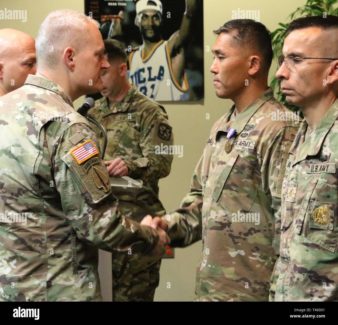 Maj. Gen. John Evans, commander of U.S. Army Cadet Command, presents ...