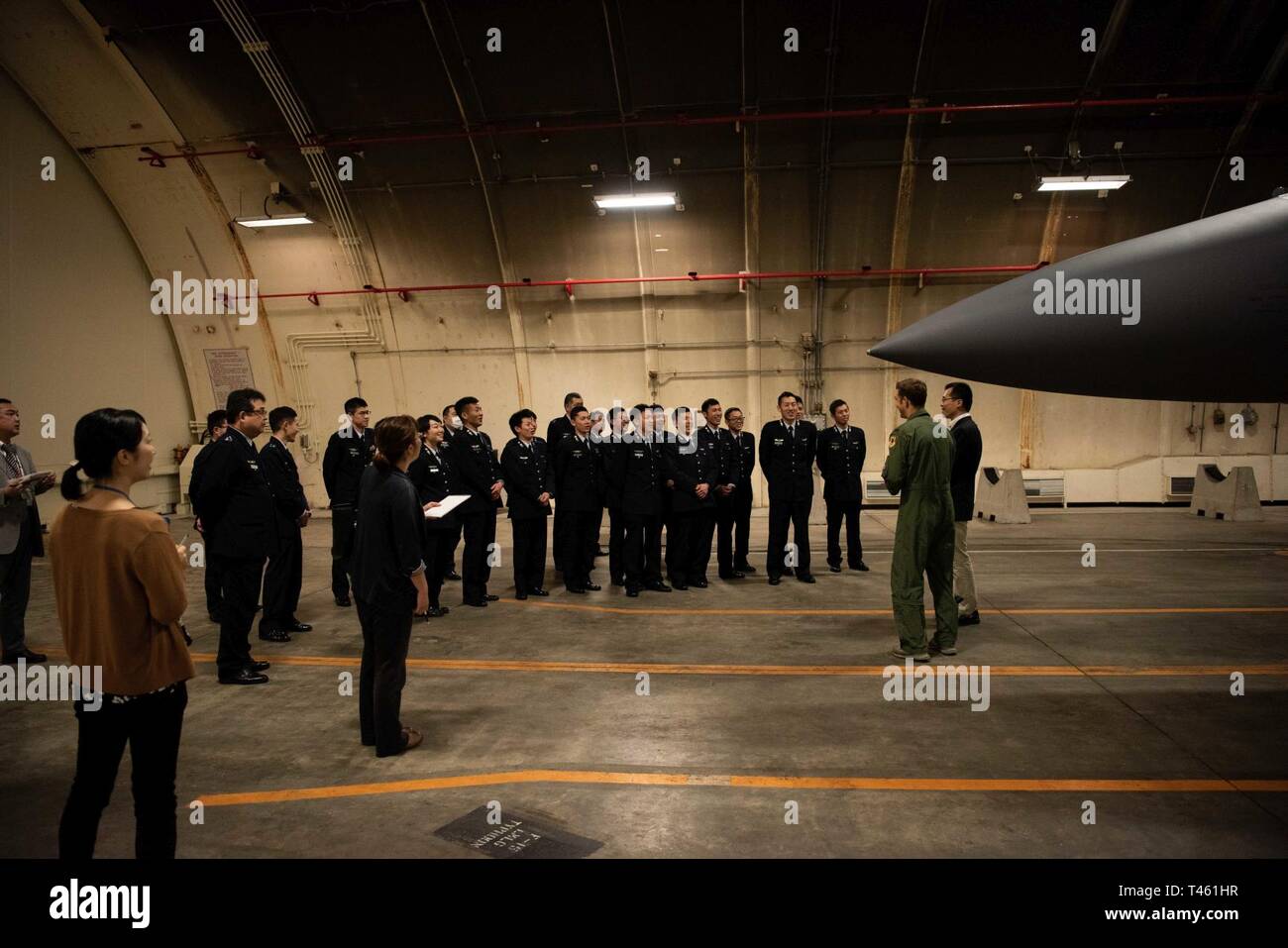 Japan Air Self-Defense Force Air Officer Candidate School cadets and instructors learn about the ...