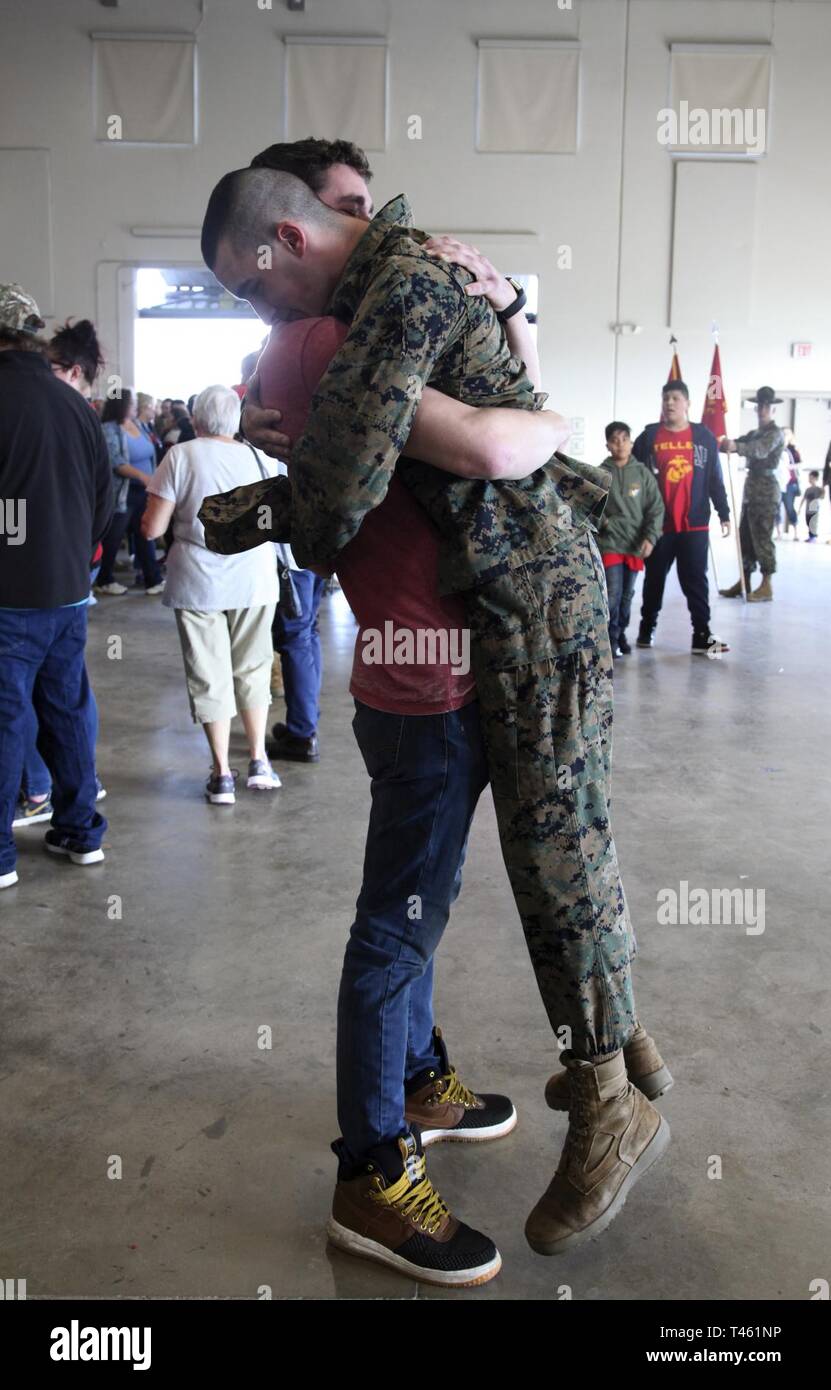 Pvt. Caleb Turmel is reunited with his family during Family Day at ...