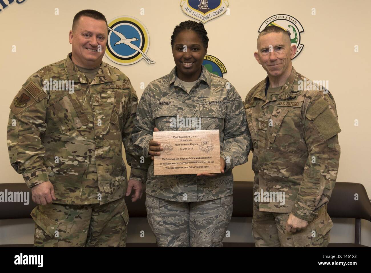 The 102nd Intelligence Wing First Sergeant’s Council presents a token of appreciation to Master ...