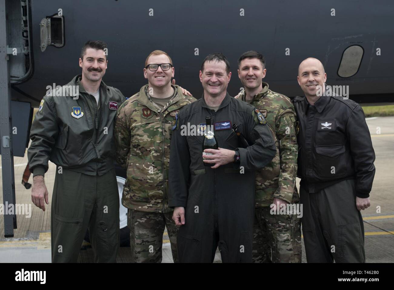U.S. Air Force Maj. Steven Strasbaugh, center, 351st Air Refueling ...