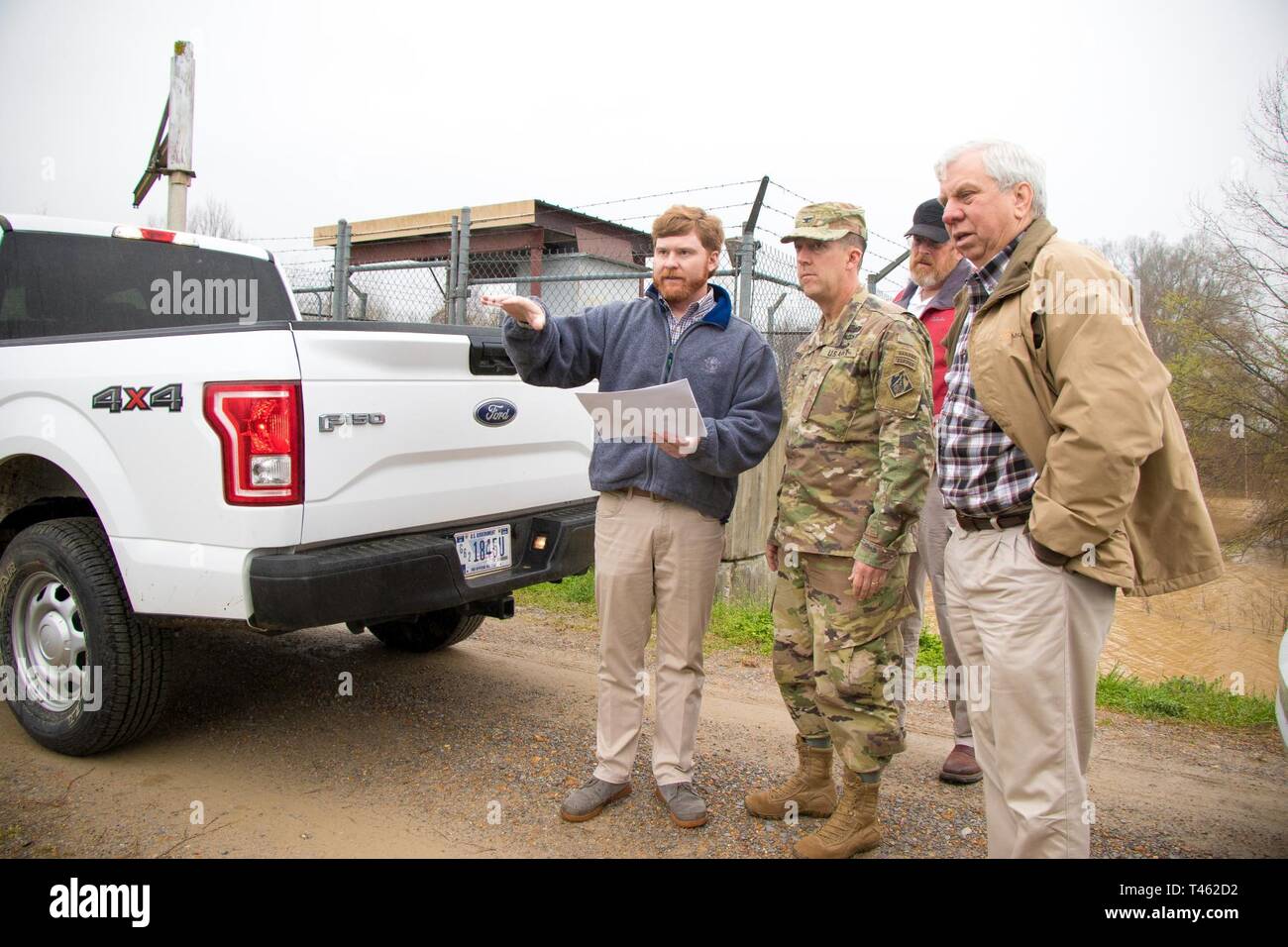 From left, Jason Overstreet, area engineer for the U.S. Army Corps of ...