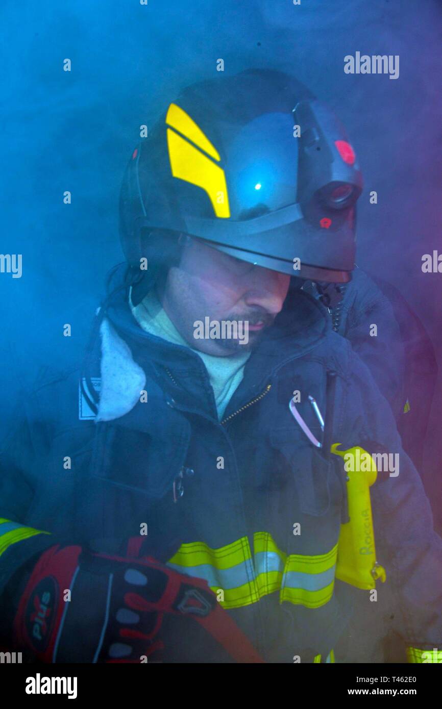 U.S. Army Garrison Italy firefighters and a Italian firefighter ...