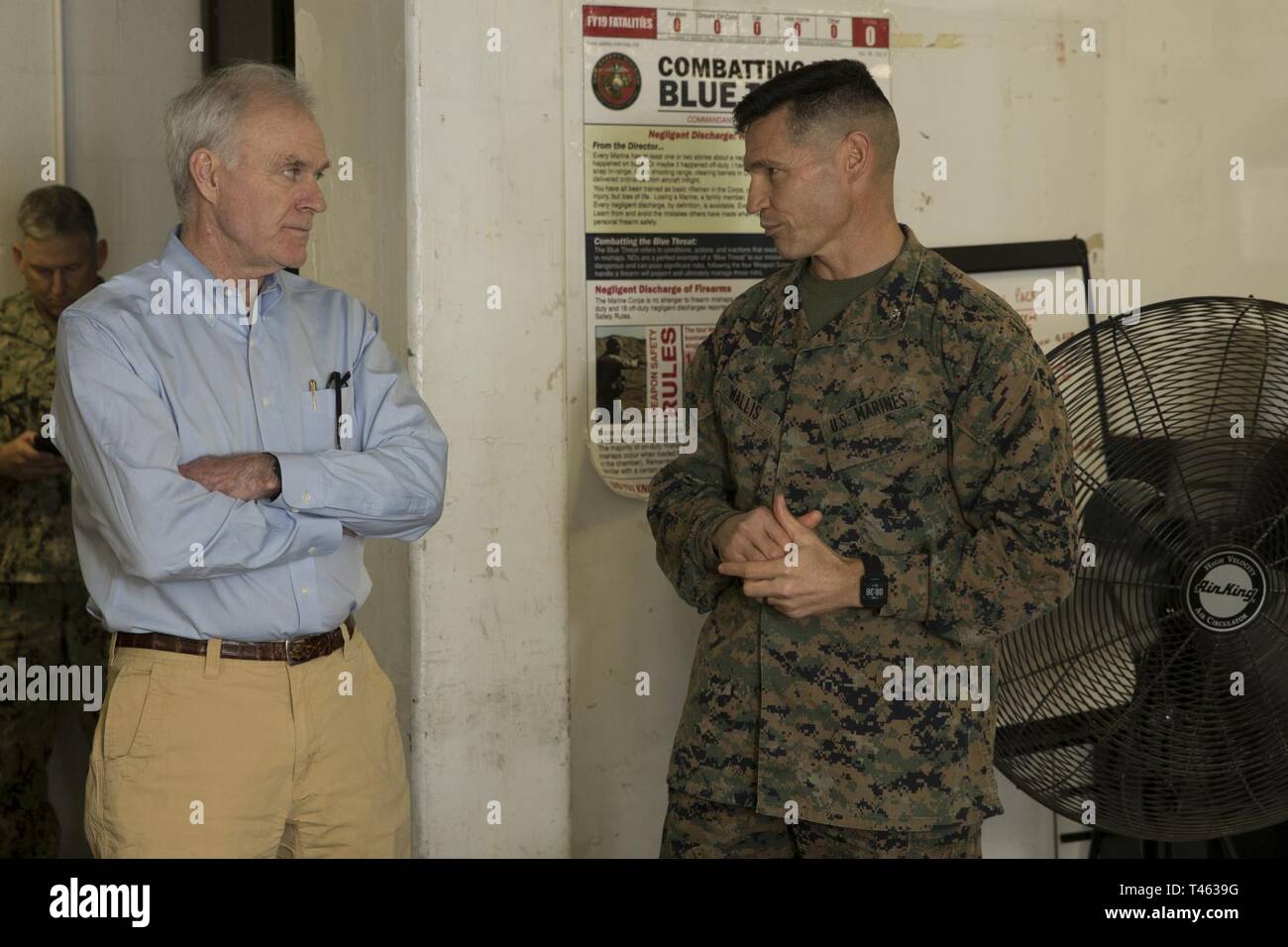 U.S. Marine Corps Col. David C. Wallis, right, commanding officer ...