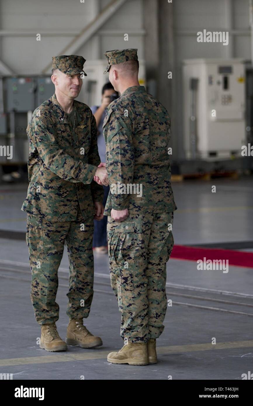 U.S. Marine Corps LtCol. Brett W. McGregor (left) outgoing Commanding ...