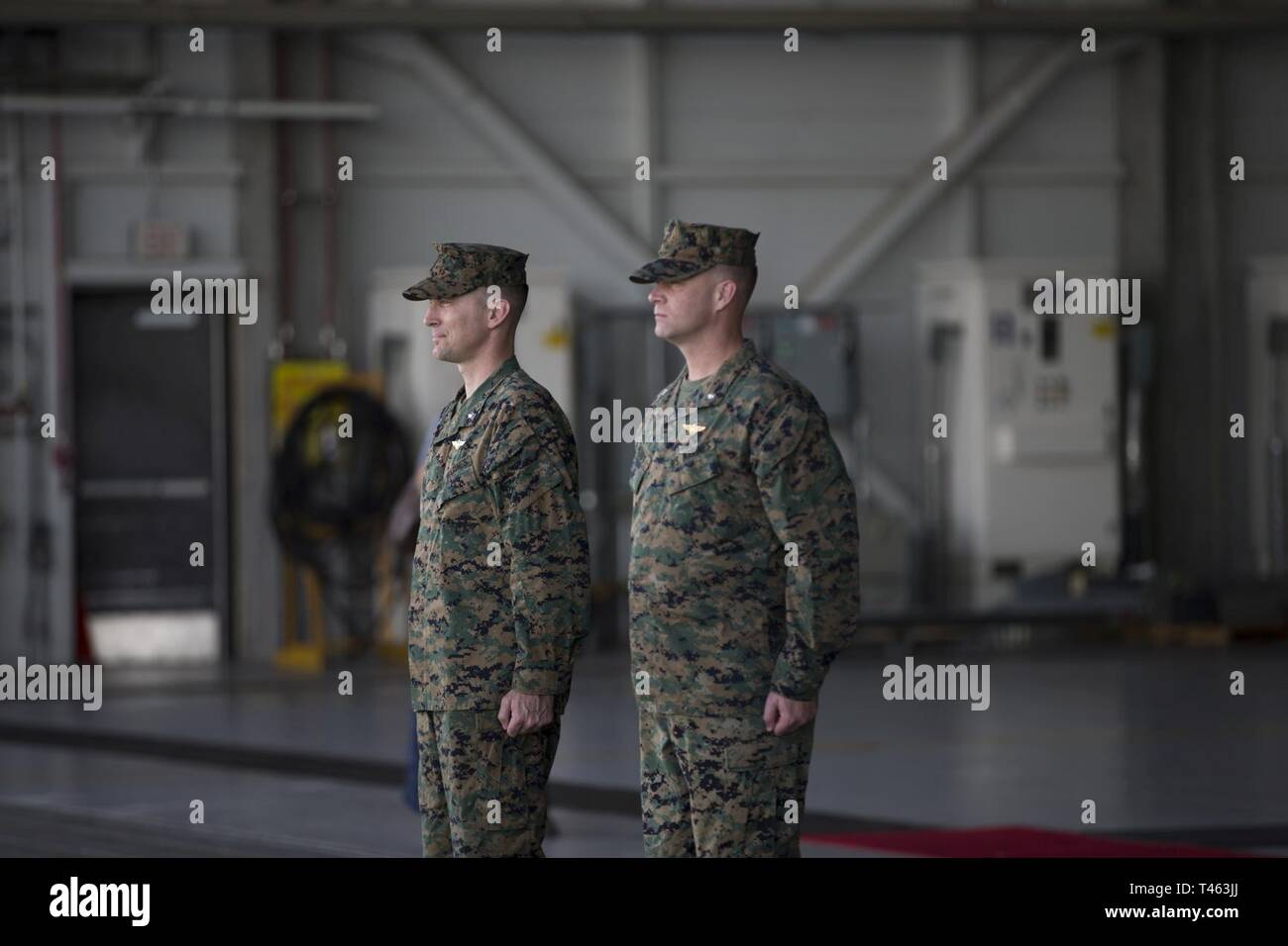 U.S. Marine Corps LtCol. Brett W. McGregor (left) outgoing commanding ...
