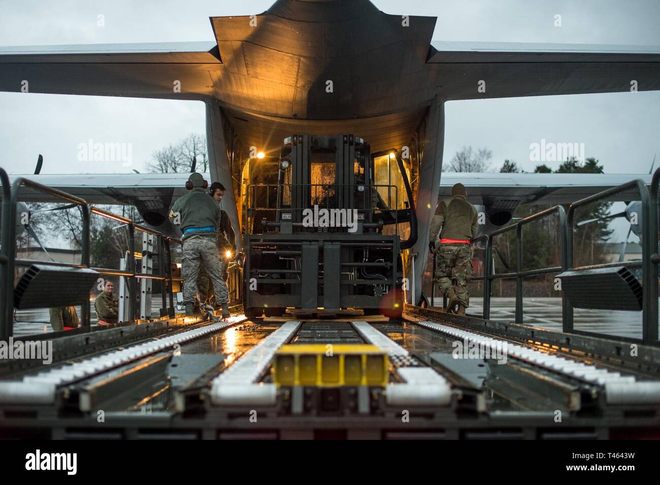 U.S. Air Force Airmen assigned to the 37th Airlift Squadron, 721st ...