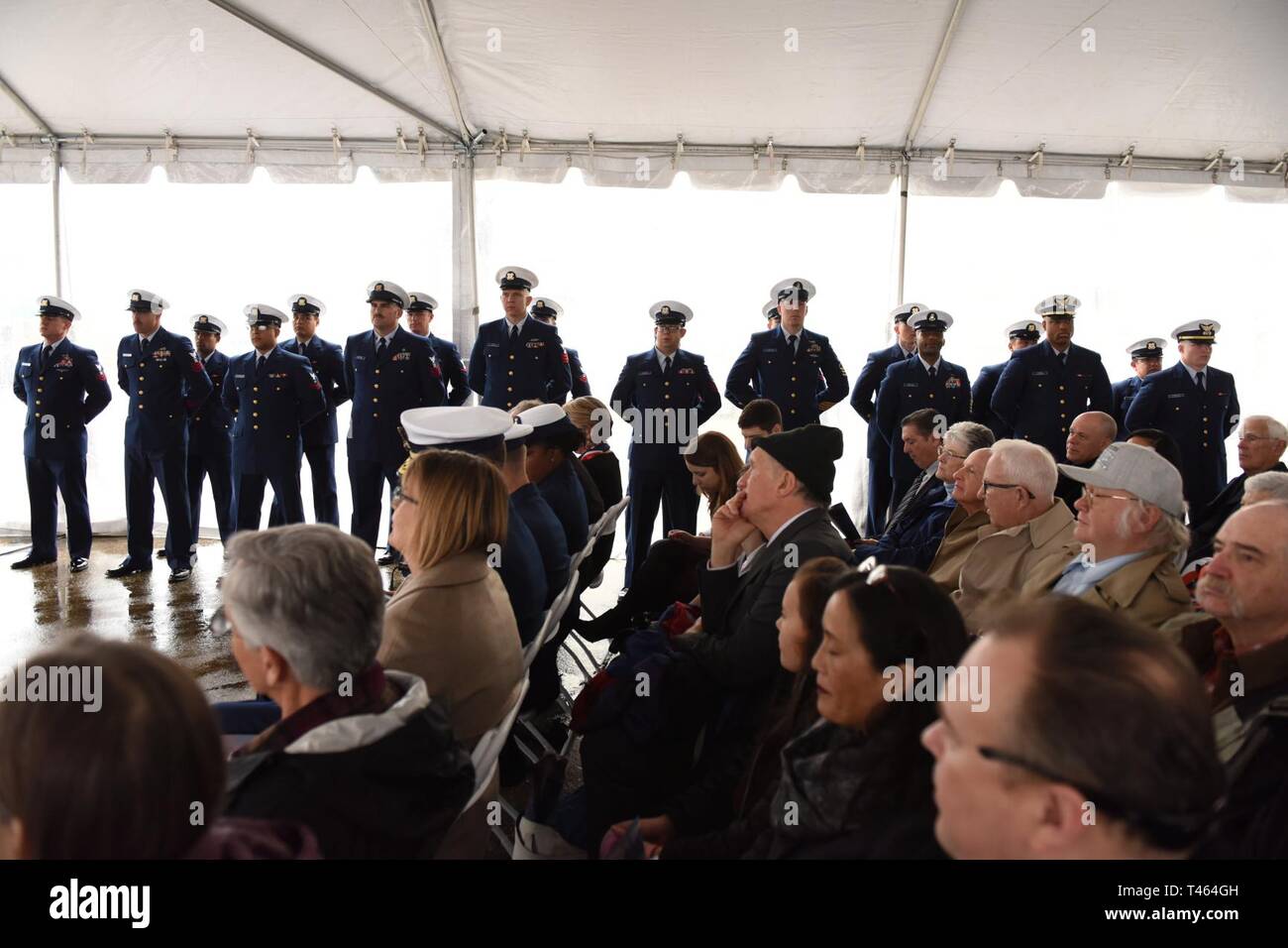 The Coast Guard Cutter Robert Ward crew stands at attention during the ...