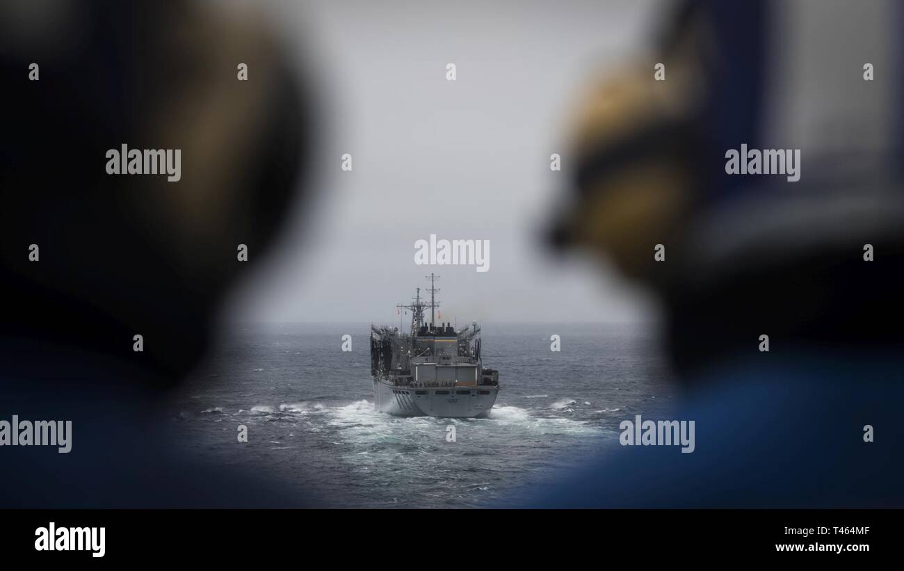 OCEAN (Mar. 2, 2019) Sailors observe the fast combat support ship, USNS ...