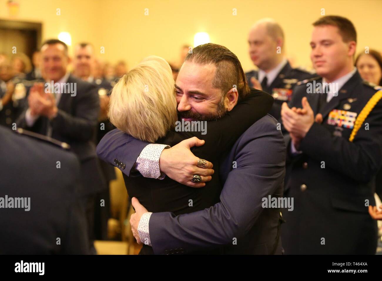 Retired U.S. Air Force Chief Master Sgt. Jeremy Hardy hugs Dawn ...