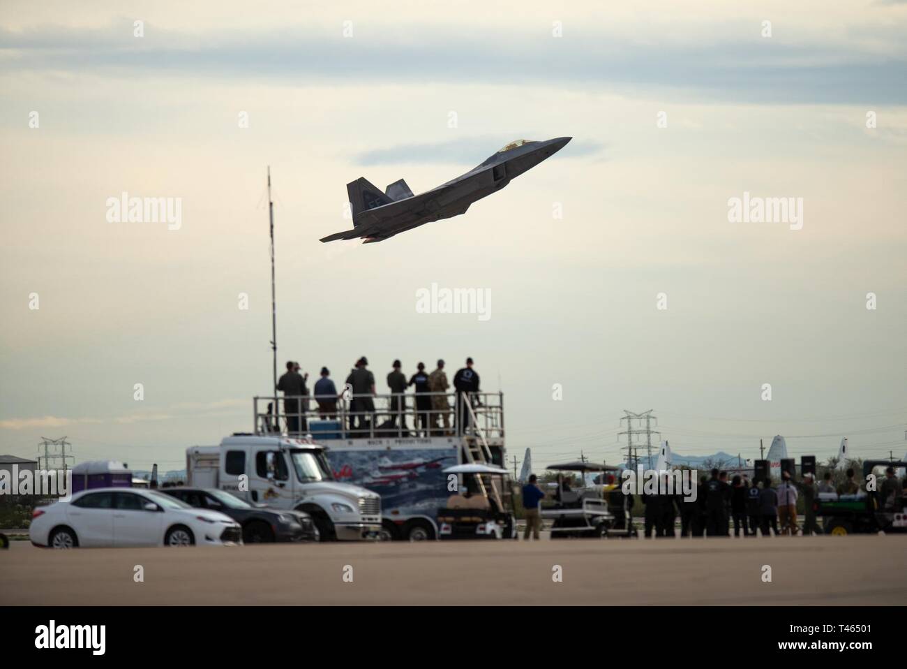 The F-22 Raptor Demo Team pilot flies over the flightline during the ...