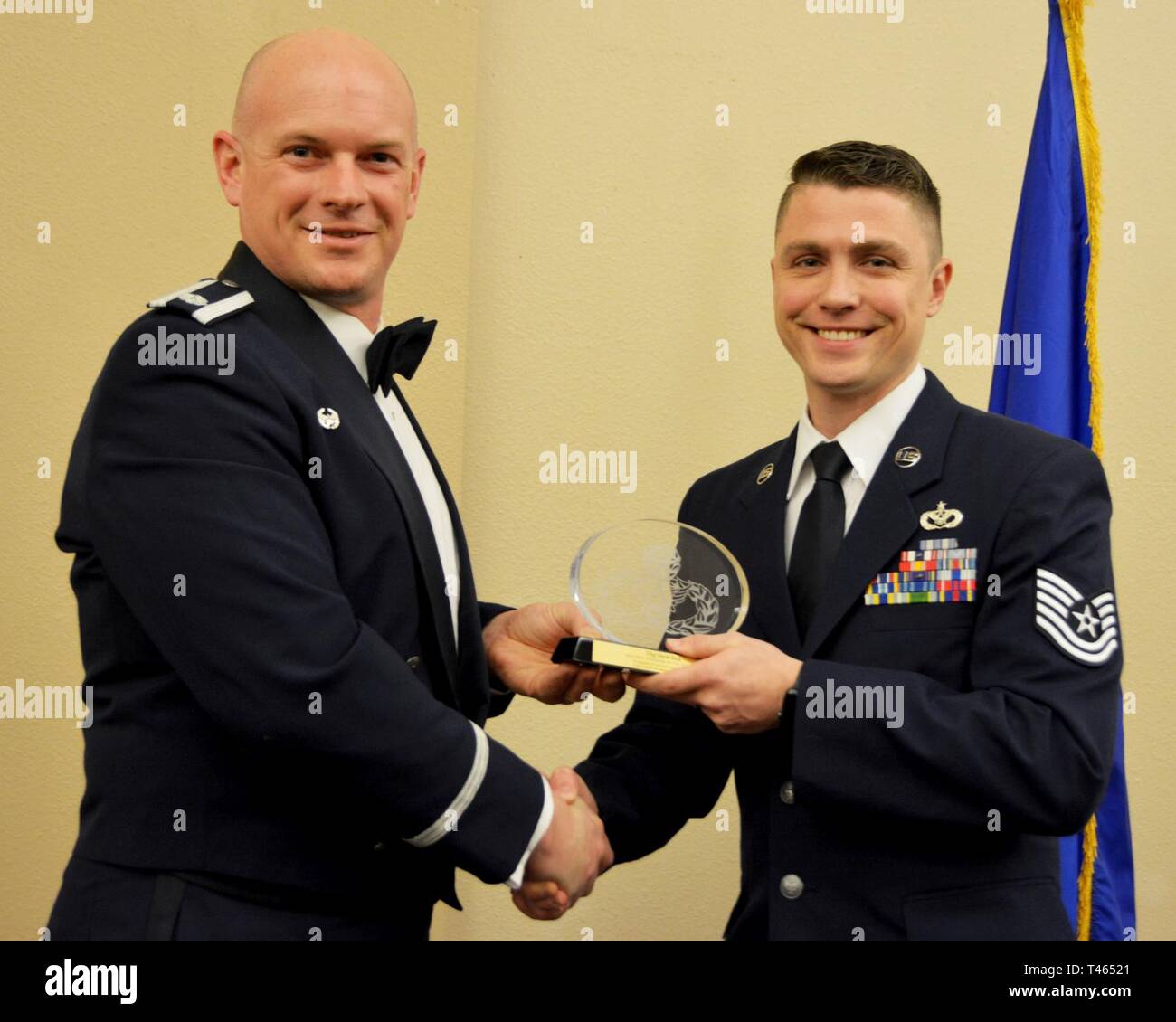 Lt. Col. Dustin Born, 507th Civil Engineer Squadron commander, presents ...