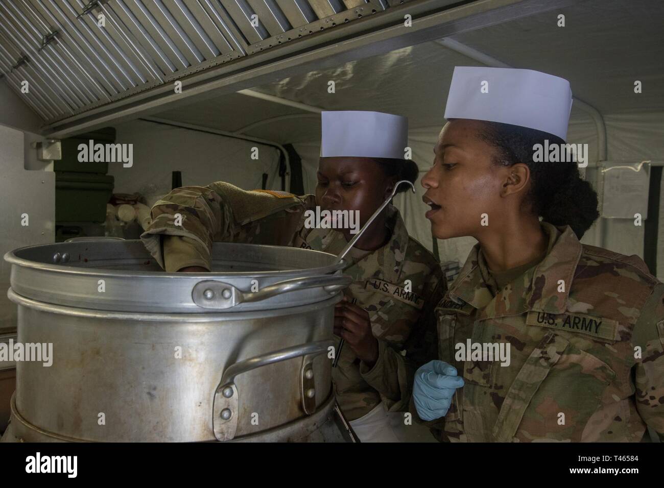 Alaska Army National Guard Pvt. Nyajuok Bol and Pvt. Subria Standifer ...