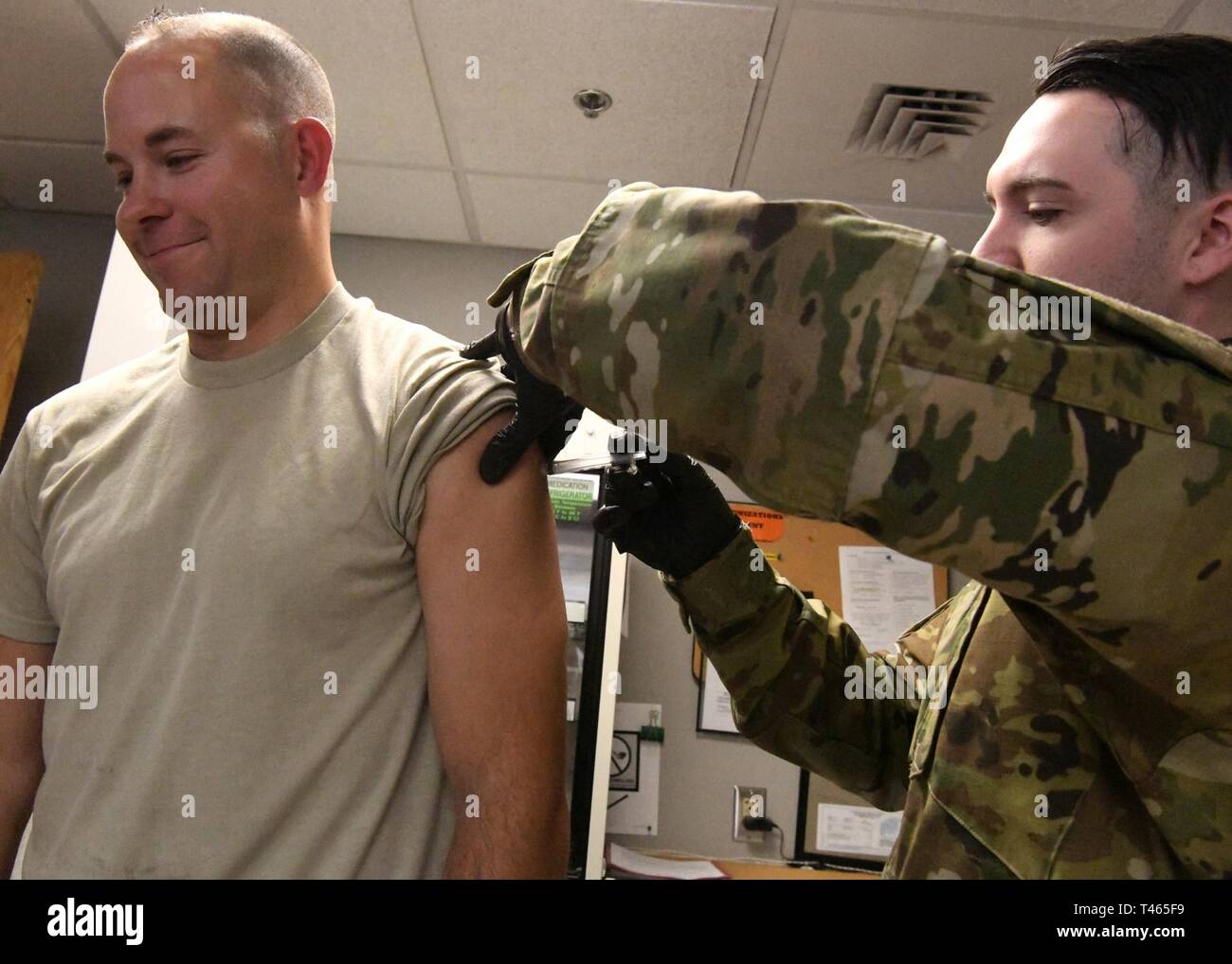 Senior Airman Alan Guin, 104th Medical Group Airman, Administers a ...
