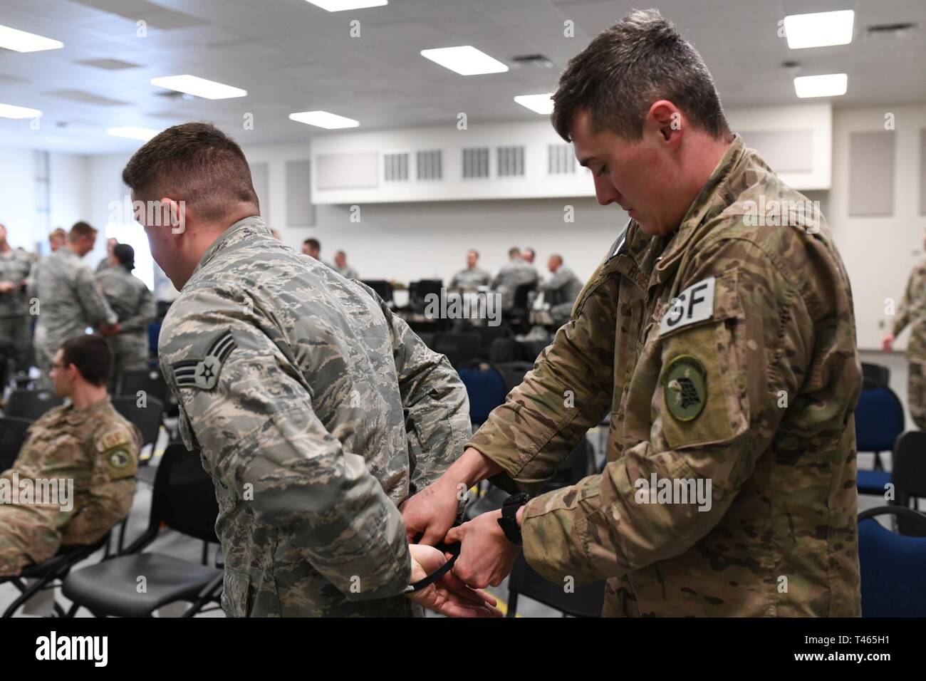 Airmen from the 142nd Security Forces Squadron conducted handcuff ...