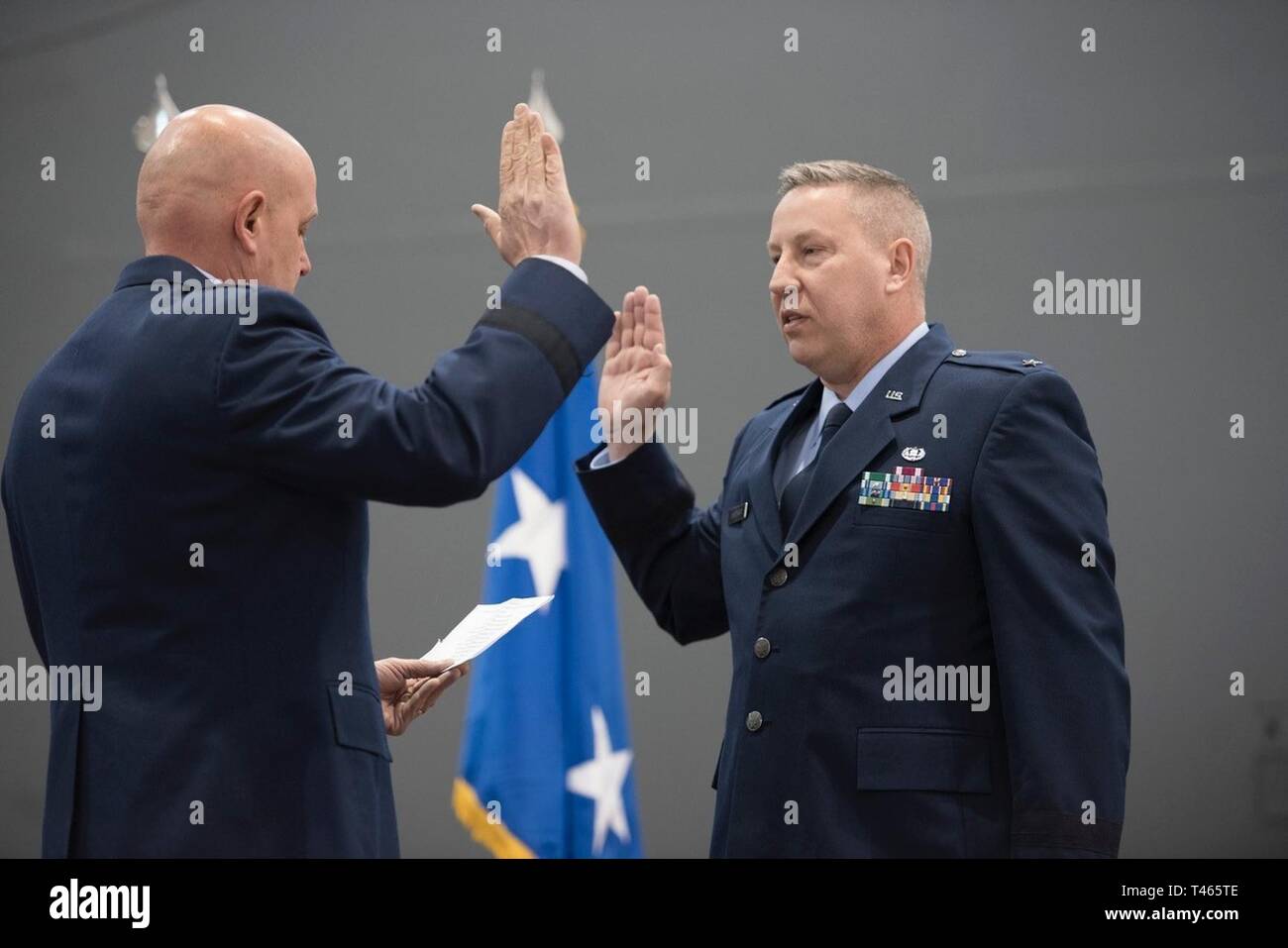 Brig. Gen. Ray Shepard takes the oath of office, administered by retired Maj. Gen. Eric ...