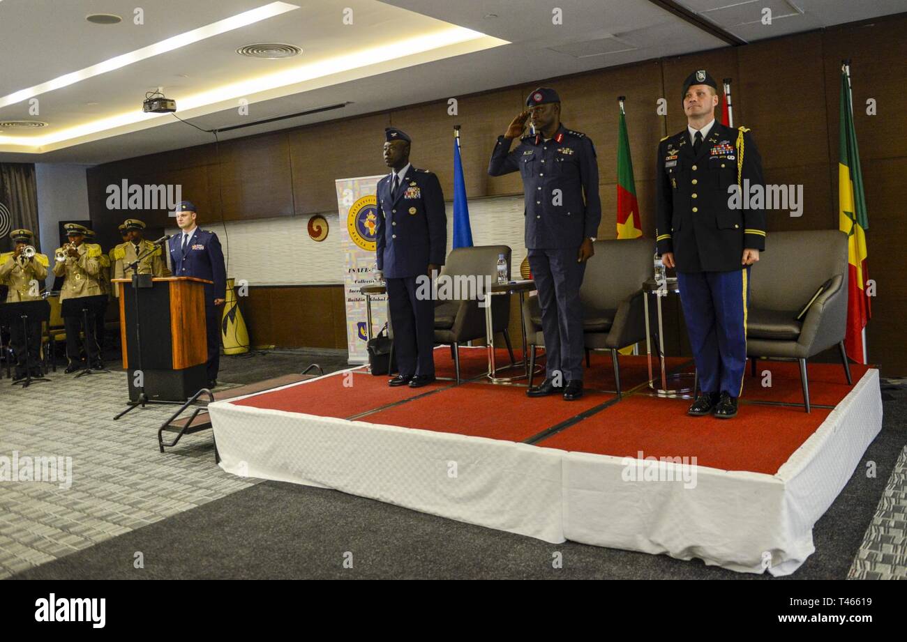 Rwanda Air Force Air Chief Maj. Gen. Charles Karamba, center, is joined ...