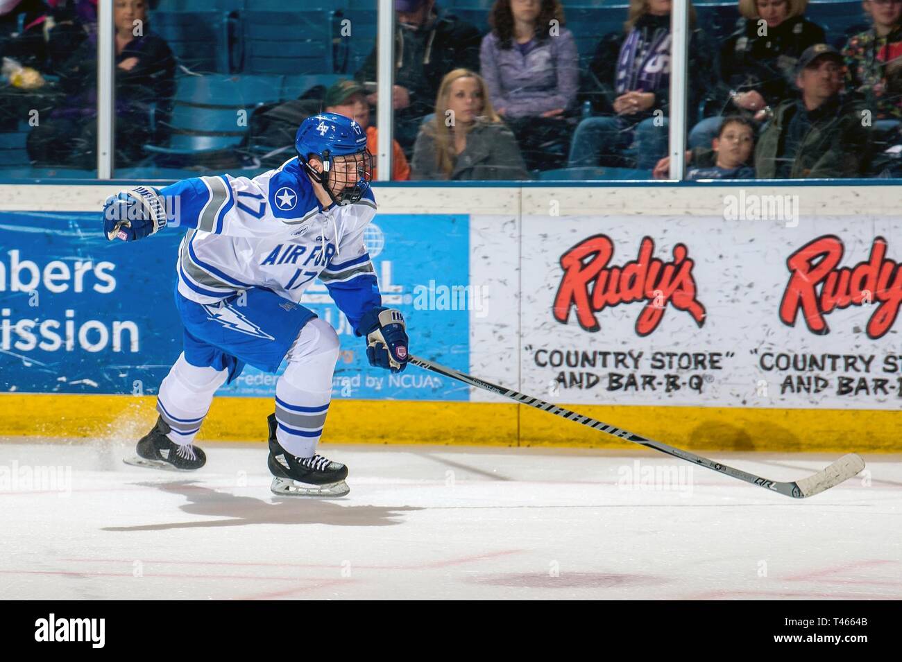U.S. Air Force Academy – Air Force's Joe Tyran chases skates to recover ...