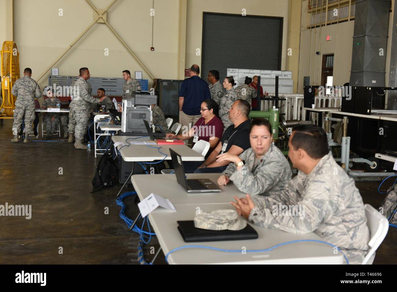 Wing members staffing the Personnel Deployment Function line at Muniz ...