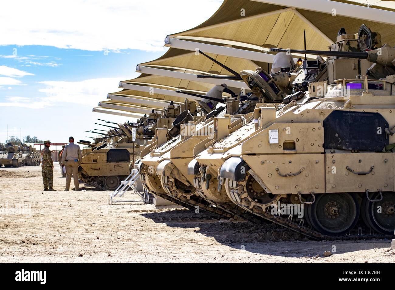 First Infantry Division Soldiers line their vehicles up to be fitted ...