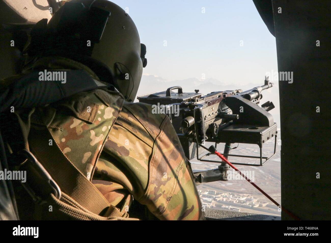 Spc. Andrew Southard, an Army black hawk crew chief with Task Force ...