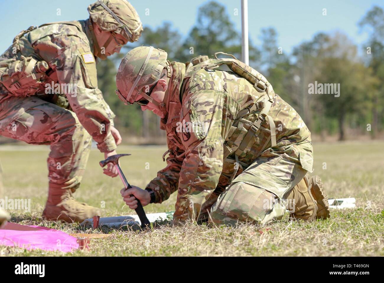 U.S. Army Capt. Jonathan Howe sets up a drop zone in a field located on ...