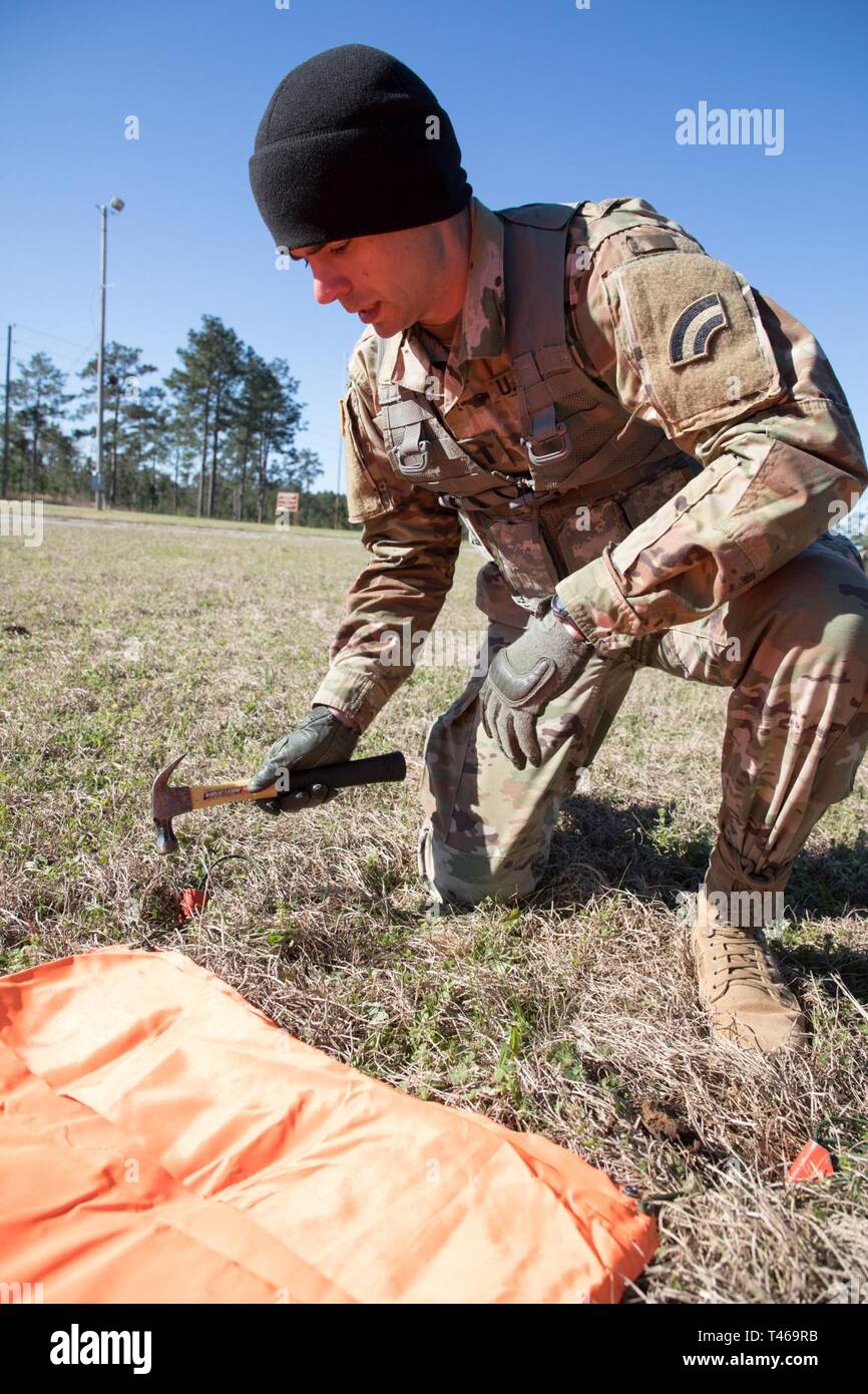 U.S. Army 1st Lt. David J. Founier sets up a VS17/GVX Signal Panel ...