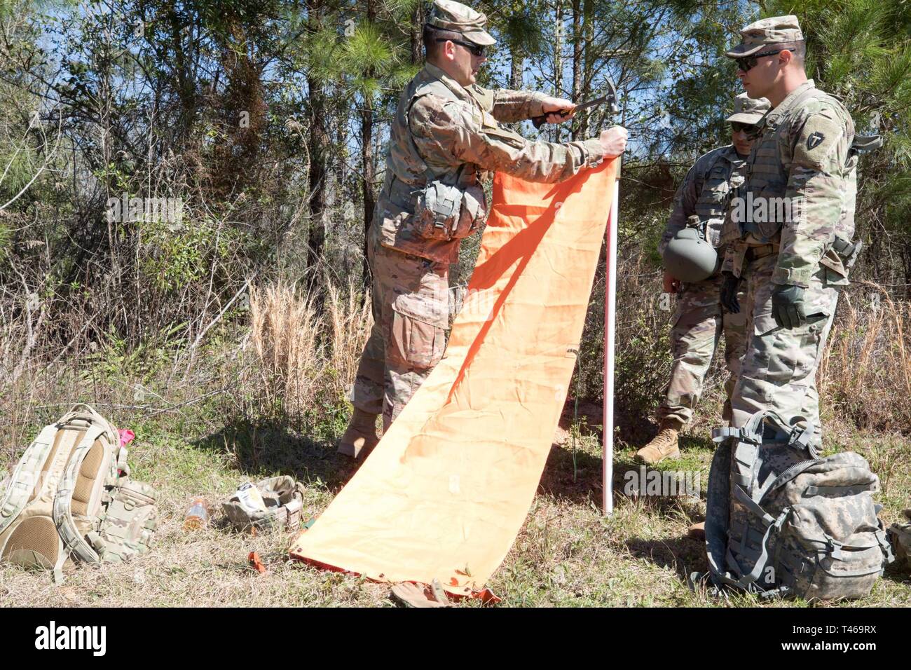 U.S. Army Soldiers set up a VS17/GVX Signal Panel while attending ...