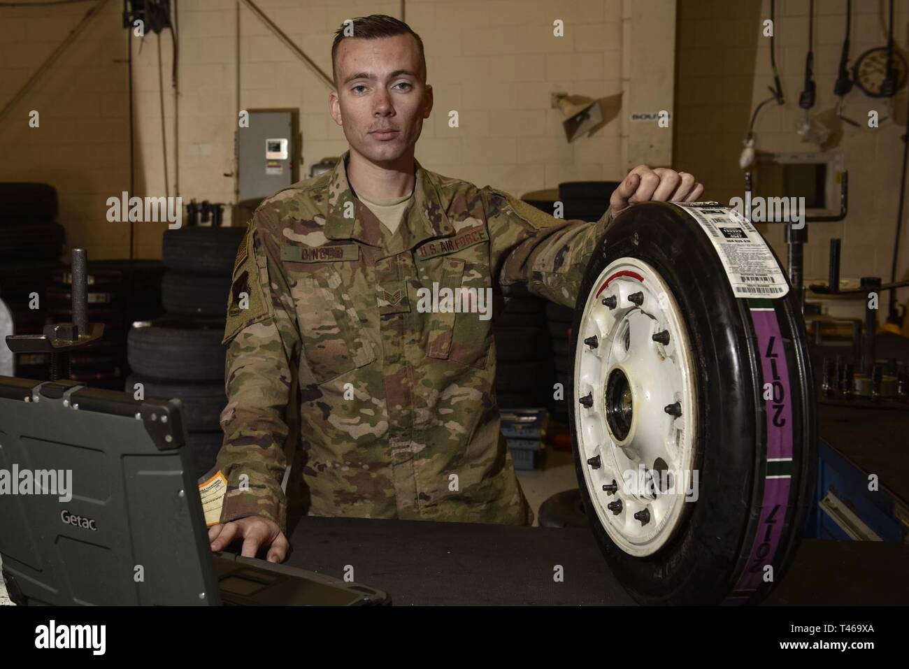 Staff Sgt. Kyle Dinger, 325th Aircraft Maintenance Squadron crew chief ...