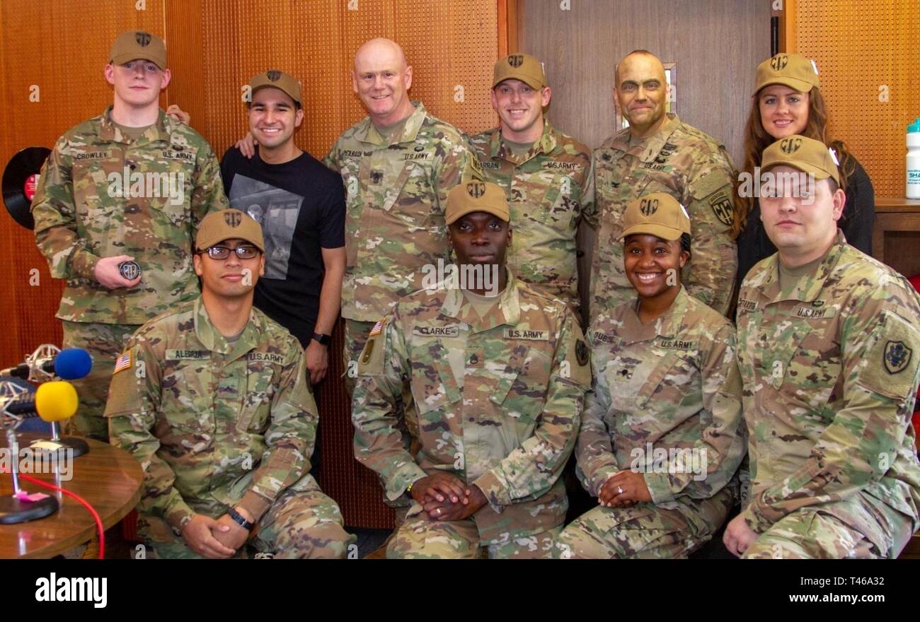 Colonel Glenn Schmick, the 18th Military Police Brigade Commander, and ...