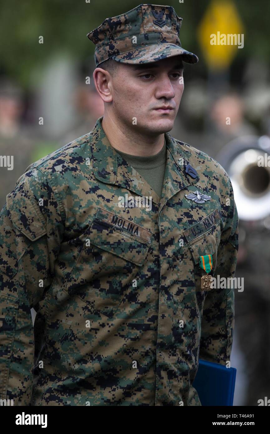 Petty Officer 2nd Class Juan Molina with 1st Marine Division is awarded ...