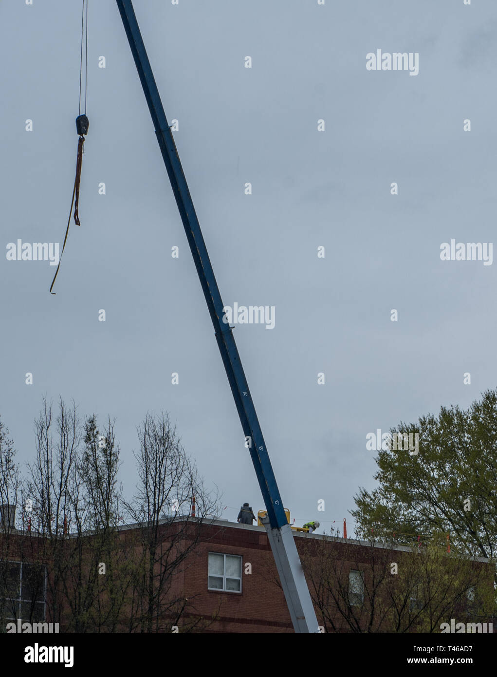 Crane on roof hi-res stock photography and images - Alamy