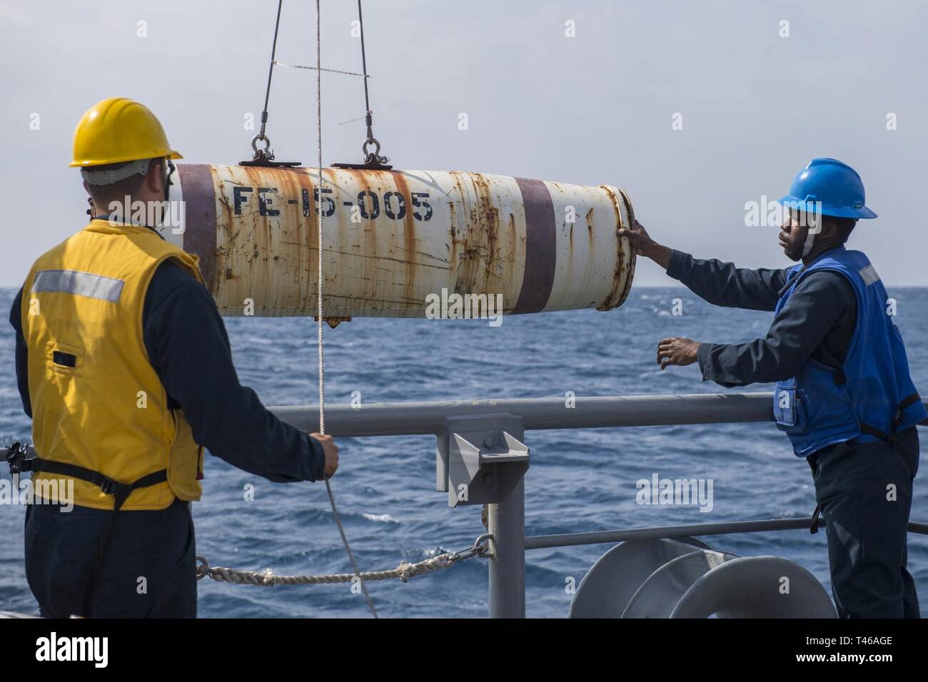 PHILIPPINE SEA (March 07, 2019) Mineman Seaman Lionel Harris guides a ...
