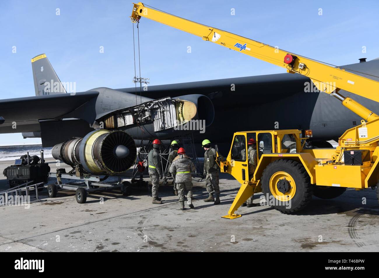5th Maintenance Group Airmen work on an engine of a B-52H ...