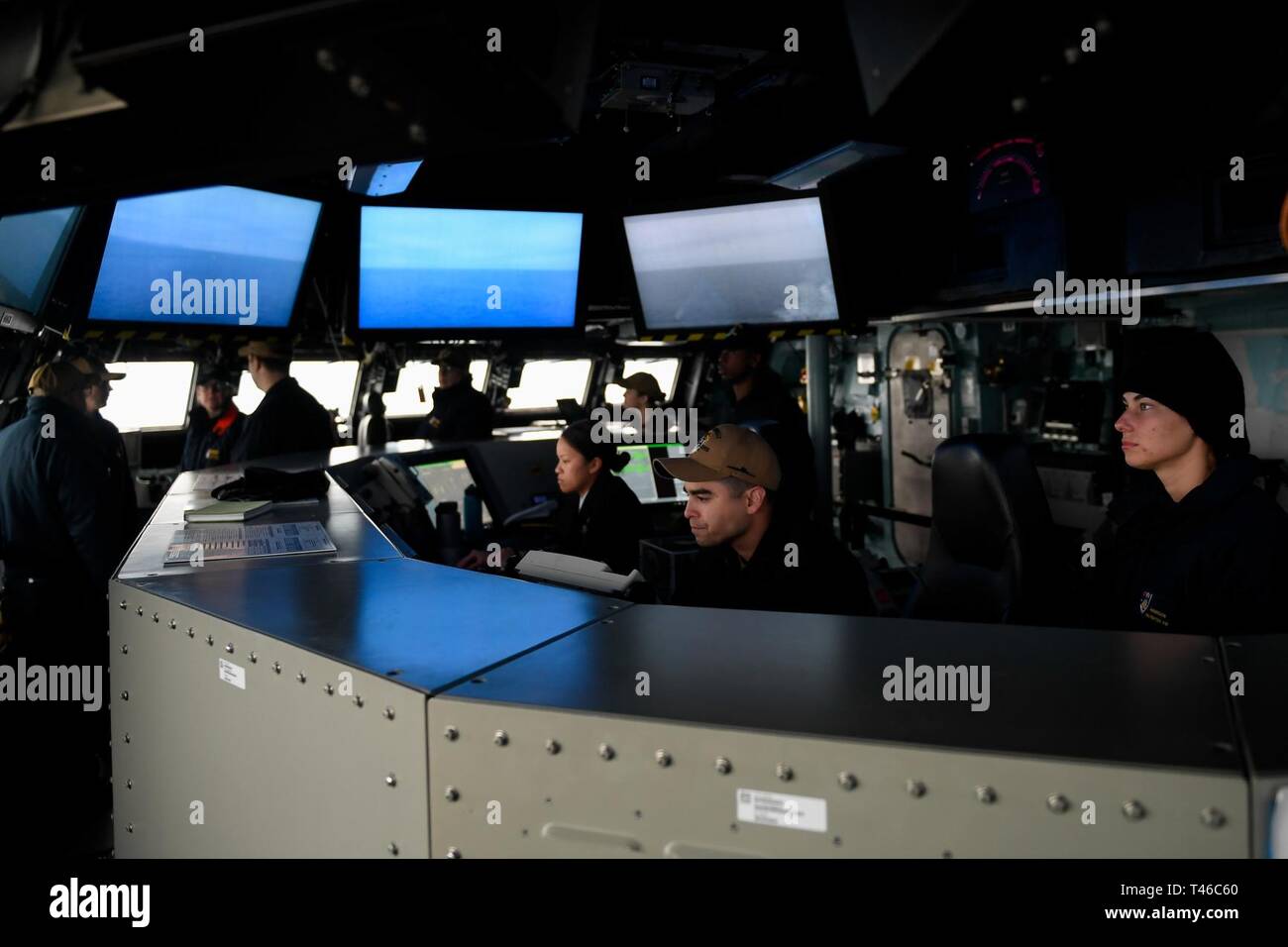 PACIFIC OCEAN (Mar 11, 2019) Sailors stand watch on the bridge aboard ...