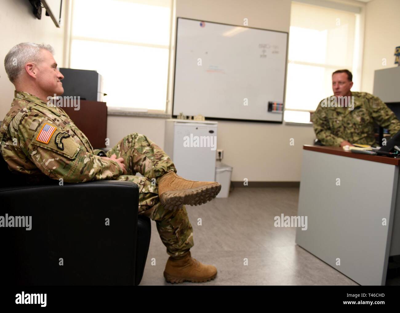 U.S. Army Command Sgt. Maj. Jeremiah E. Inman, left, command sergeant major of U.S. Army Africa ...