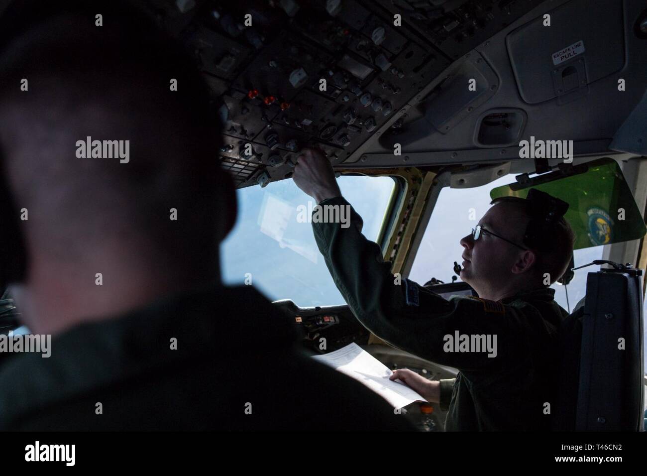 U.S. Air Force 1st Lt. Justin Niquette, right, and Capt. Mark Stewart ...