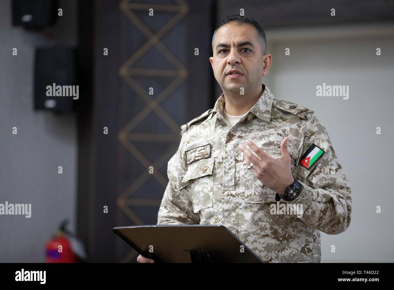 Jordan Armed Forces Maj. Yarob Alqudah, a military judge, speaks during ...