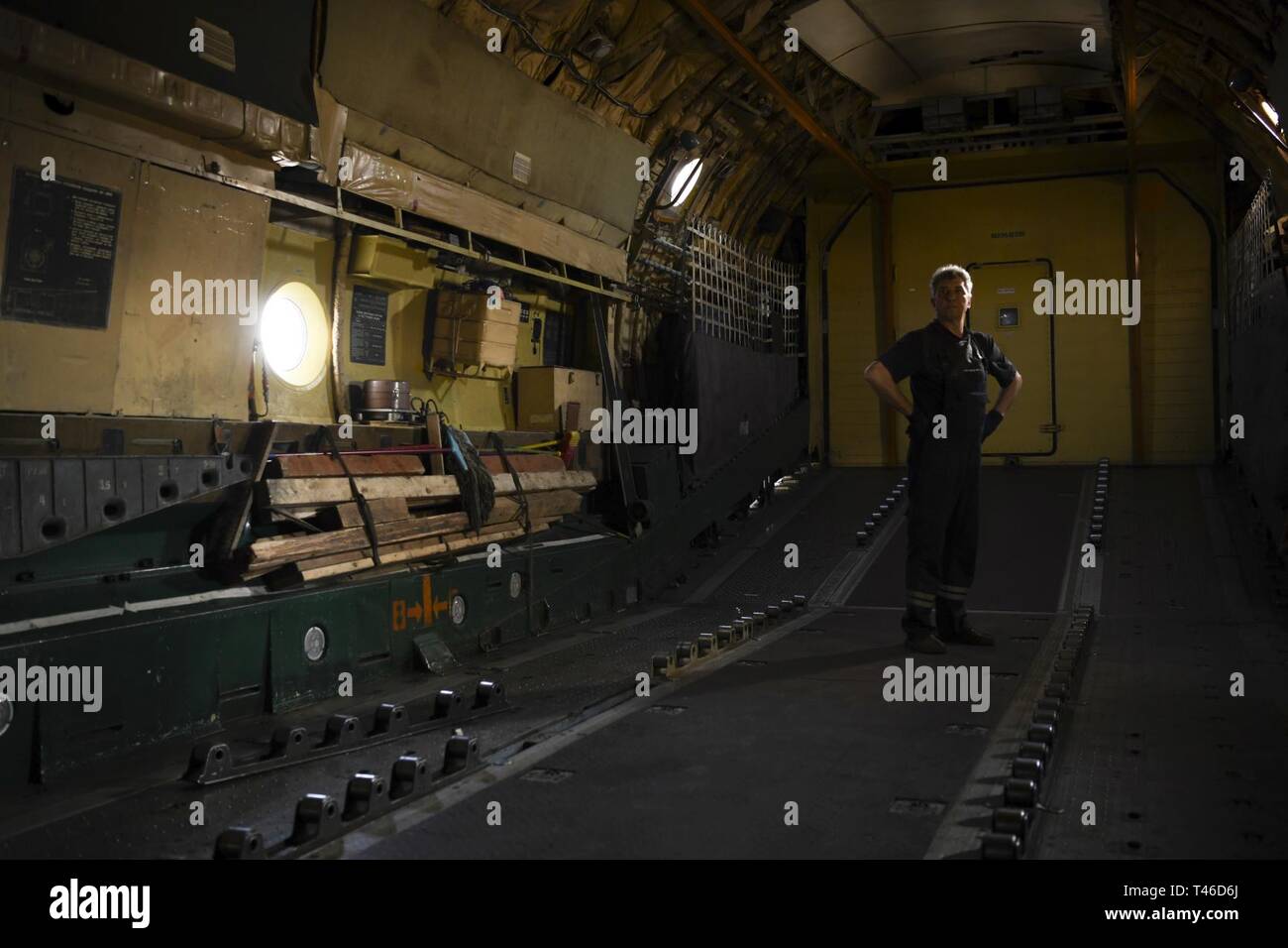A crew member stands inside a commercial Ilyushin Il-76 prior to ...