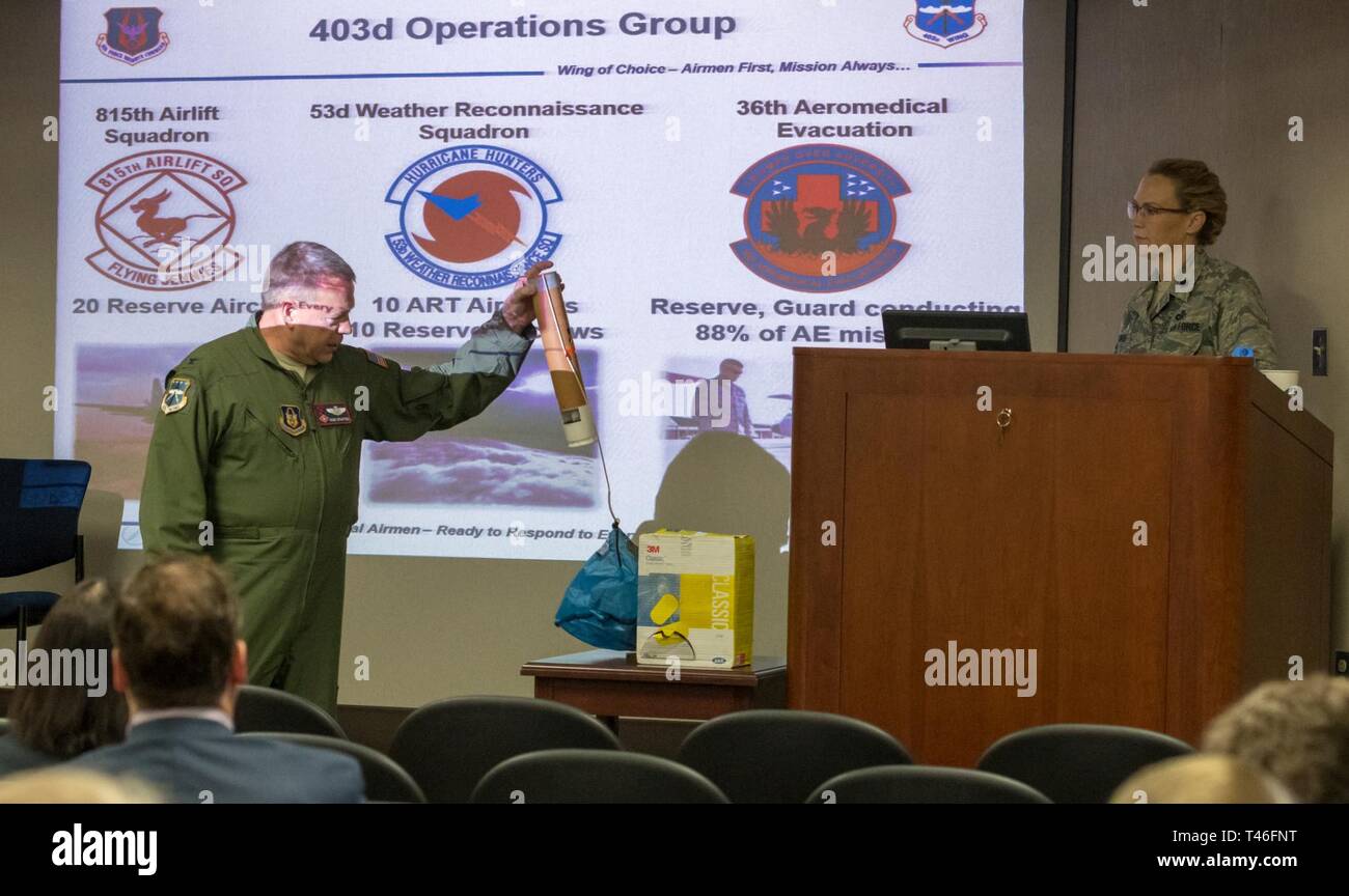 U.S. Air Force Col. Robert Stanton, 403rd Wing vice commander, holds a ...