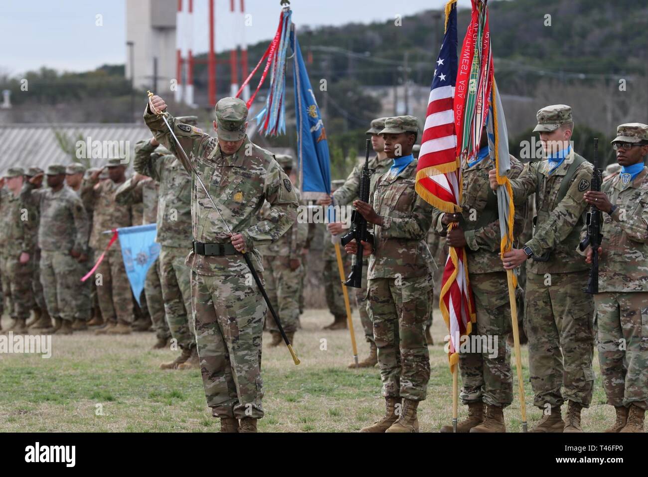 Sgt. 1st Class Bradley Rasdall sheaths the non-commissioned officer ...