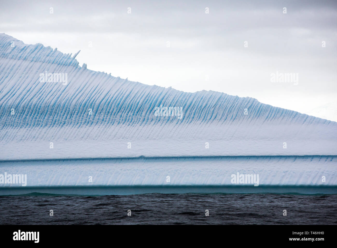 A sculpted iceberg near Orne Harbour, Antarctic Peninsular Stock Photo ...