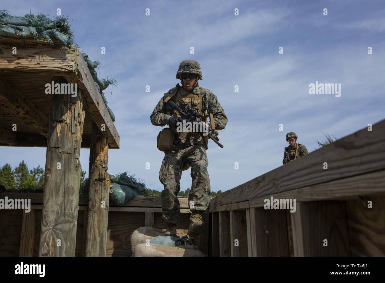 A U.S. Marine with 2nd Combat Engineer Battalion, 2nd Marine Division ...