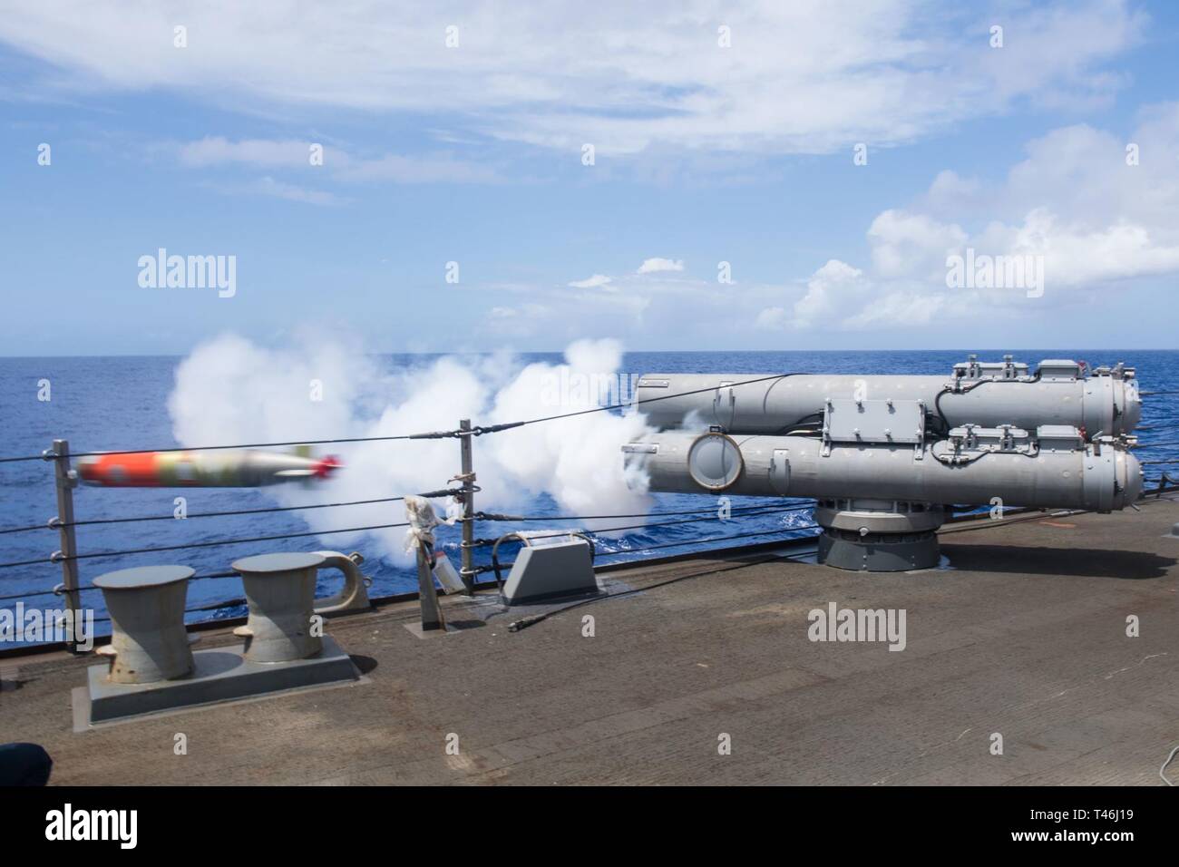 PHILIPPINE SEA (March 12, 2019) A mark 32 Mod 15 weapons system fires a ...
