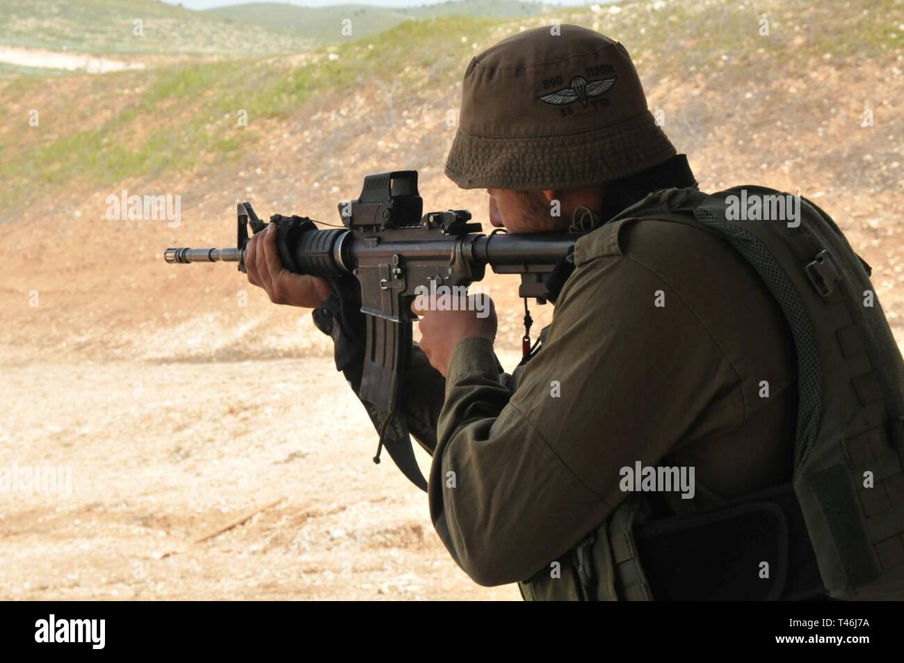 An Israeli Defense Forces soldier fires his M4 carbine during joint ...