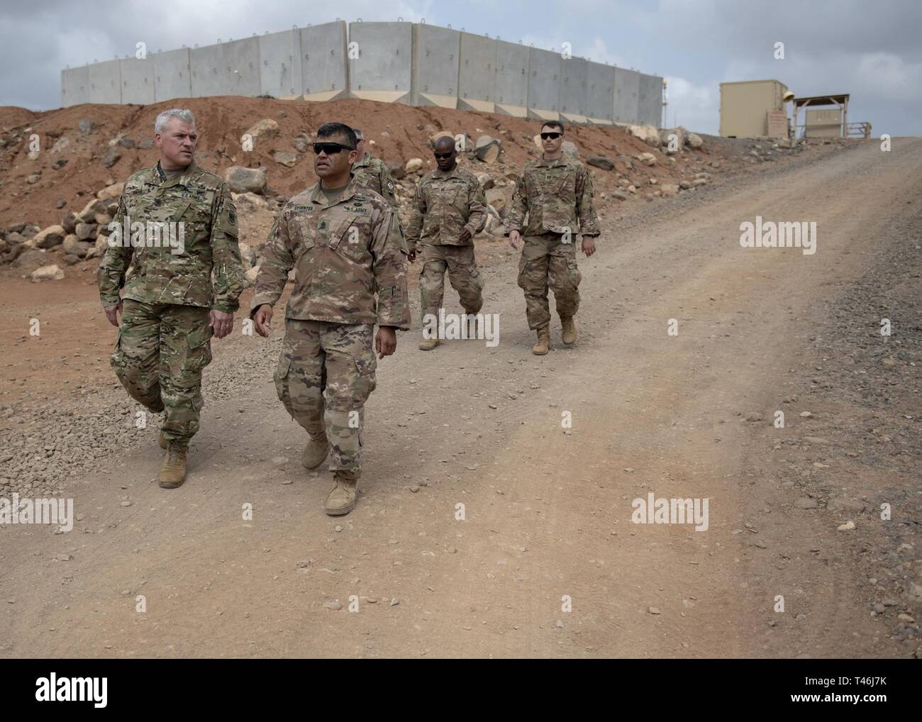 U.S. Army Command Sgt. Maj. Jeremiah E. Inman, left, command sergeant major of U.S. Army Africa ...