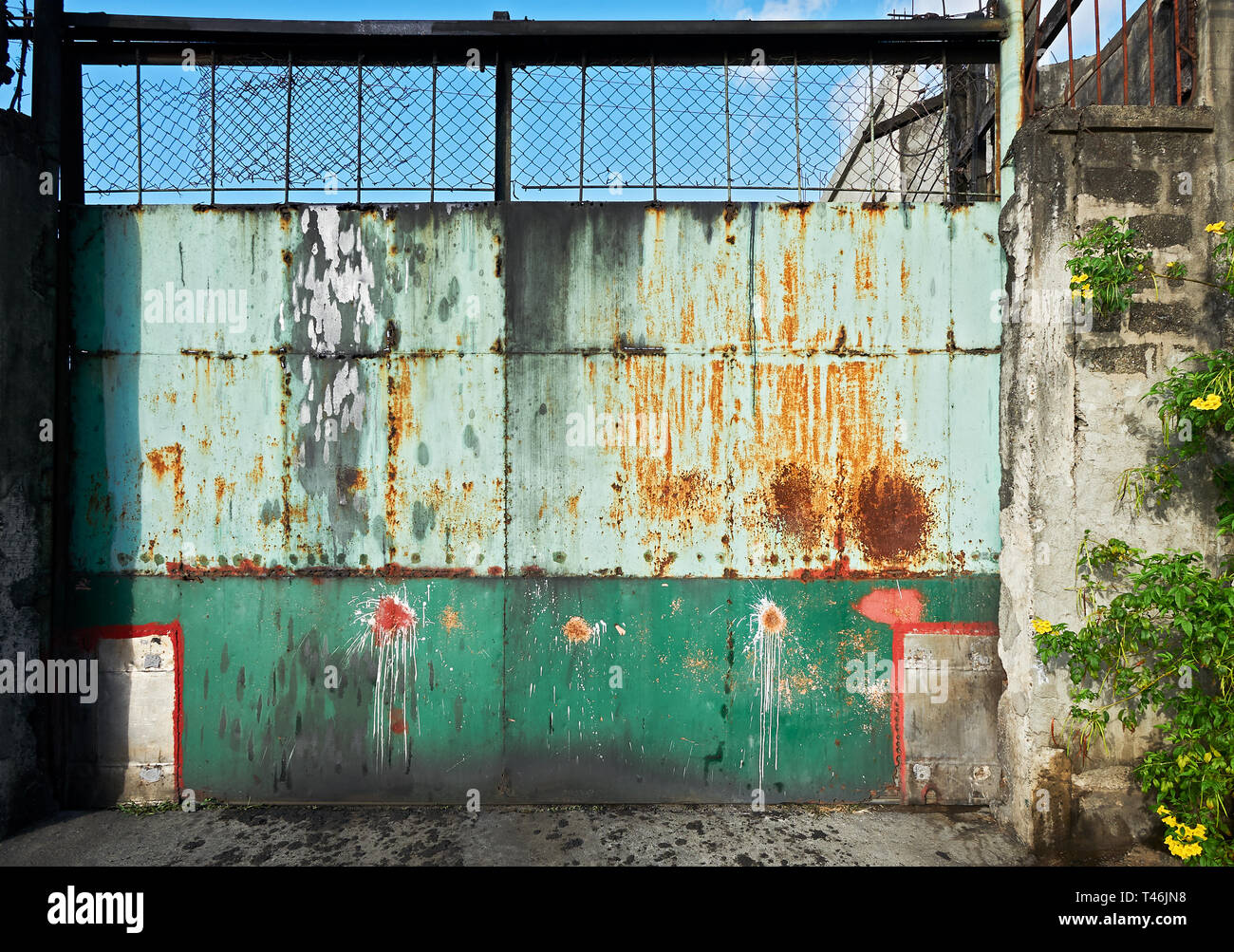 Colorful old rusty entrance metal gate pictured in Iloilo City ...