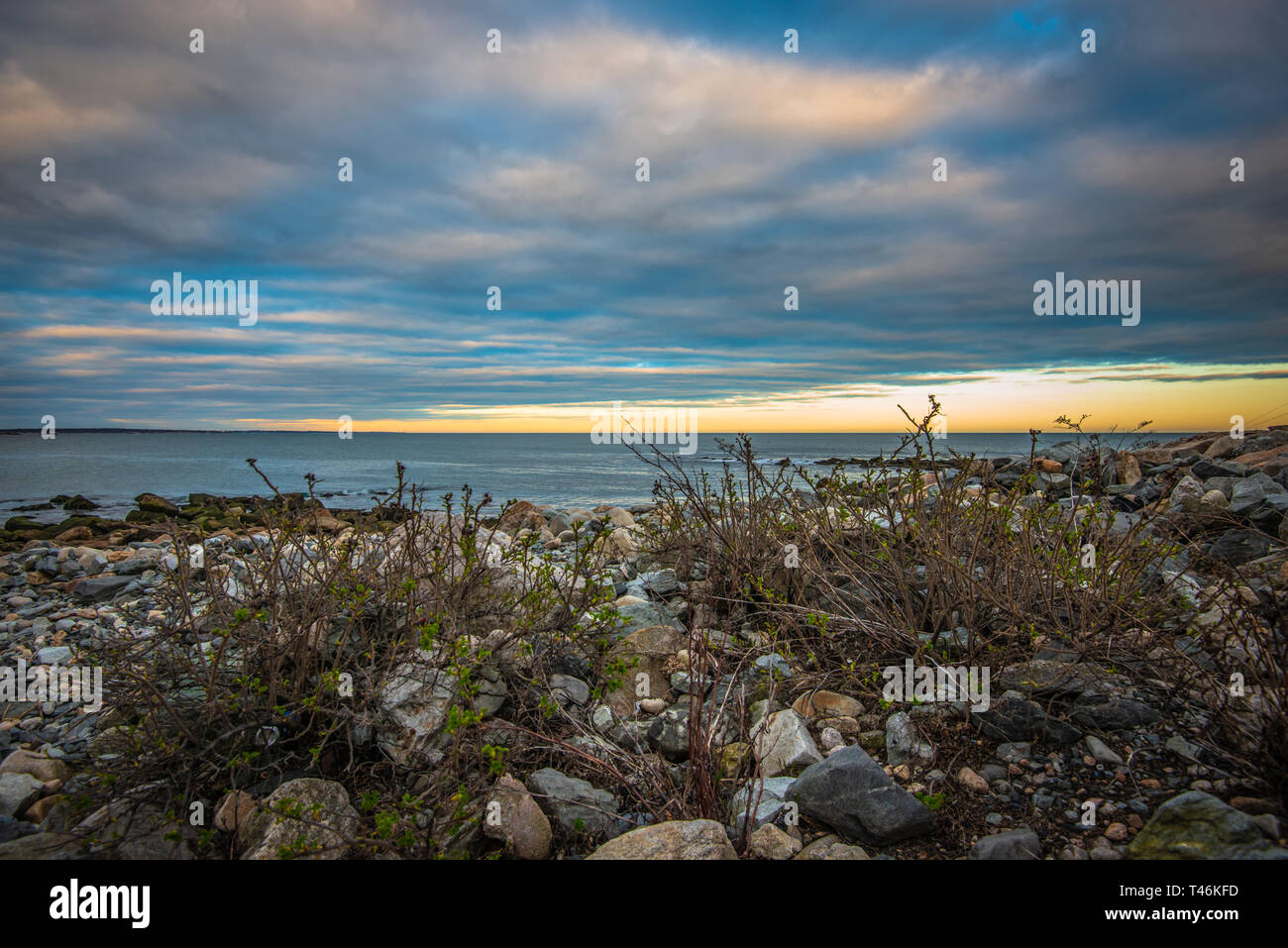 Rustic Rhode Island Coastline with Rounded Rocks and Dramatic Sky Stock ...