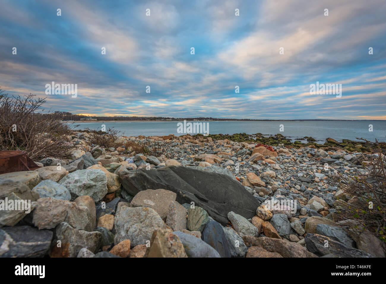 Rustic Rhode Island Coastline with Rounded Rocks and Dramatic Sky Stock ...